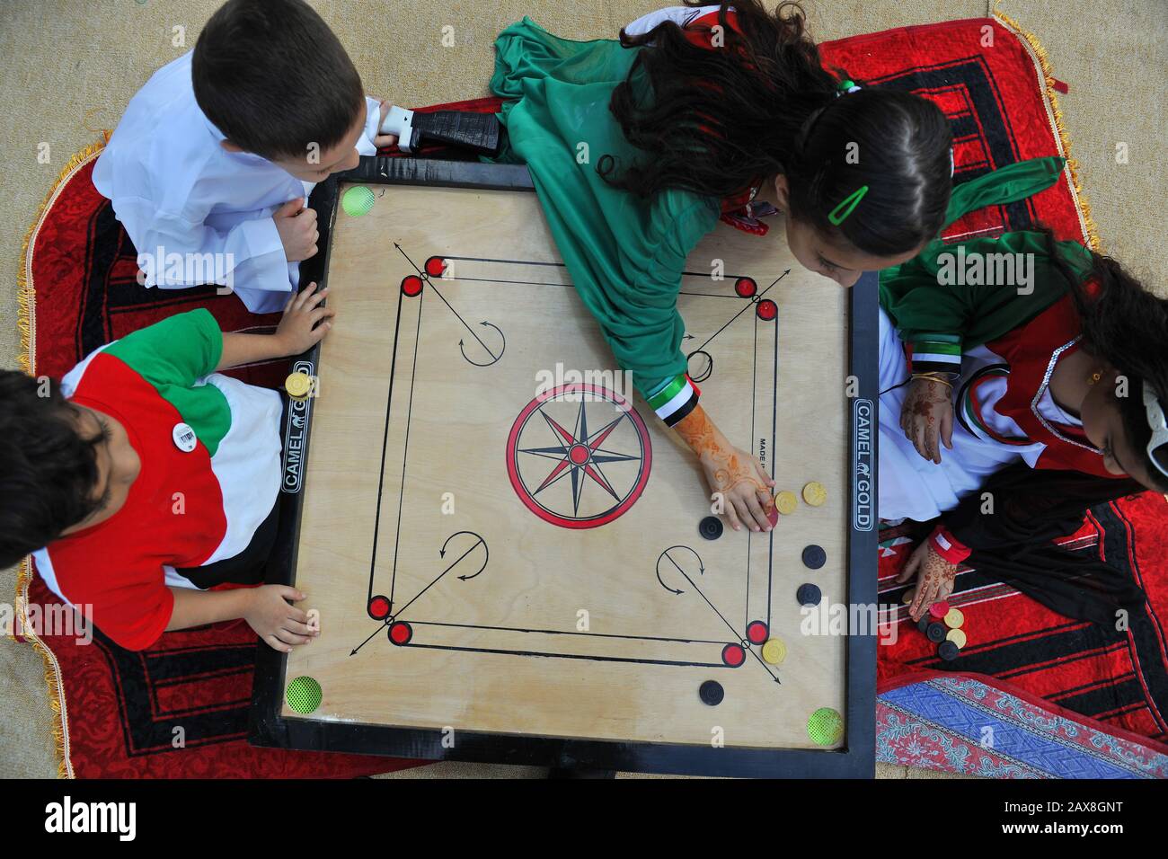 Children playing carrom hi-res stock photography and images - Alamy