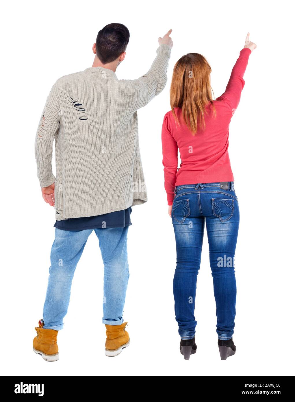 Back view of couple couple in sweater pointing. beautiful friendly girl ...