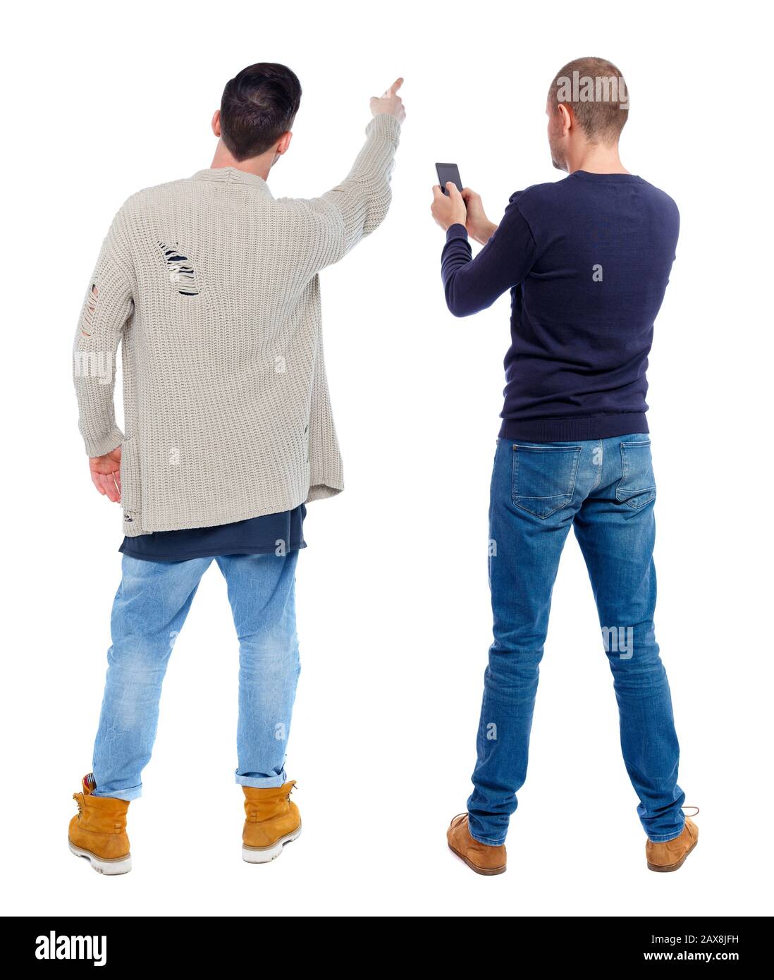 Back view of two man in sweater with mobile phone. Rear view people ...