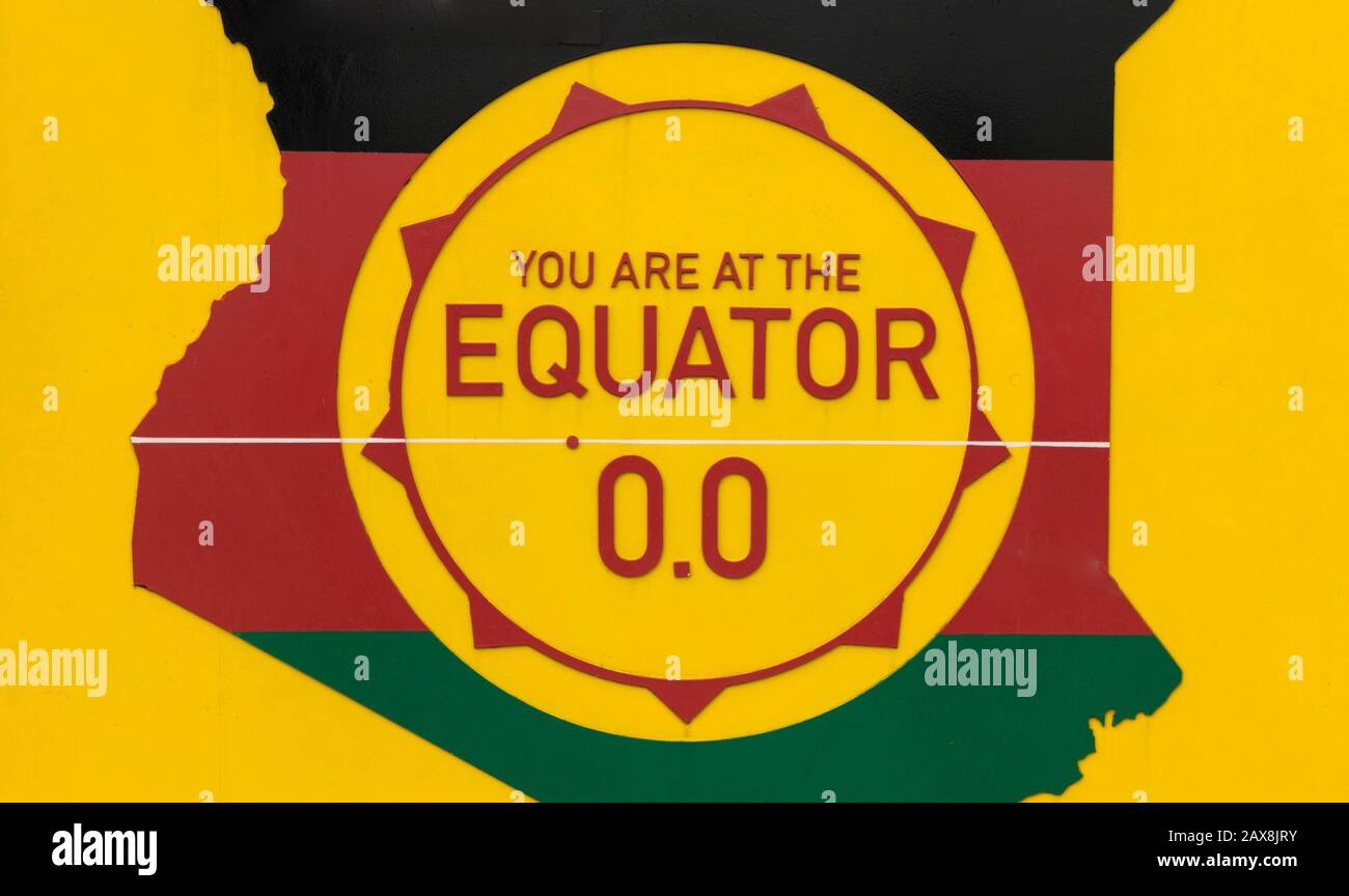 Sign marking the equator line dividing north and south hemispheres ...