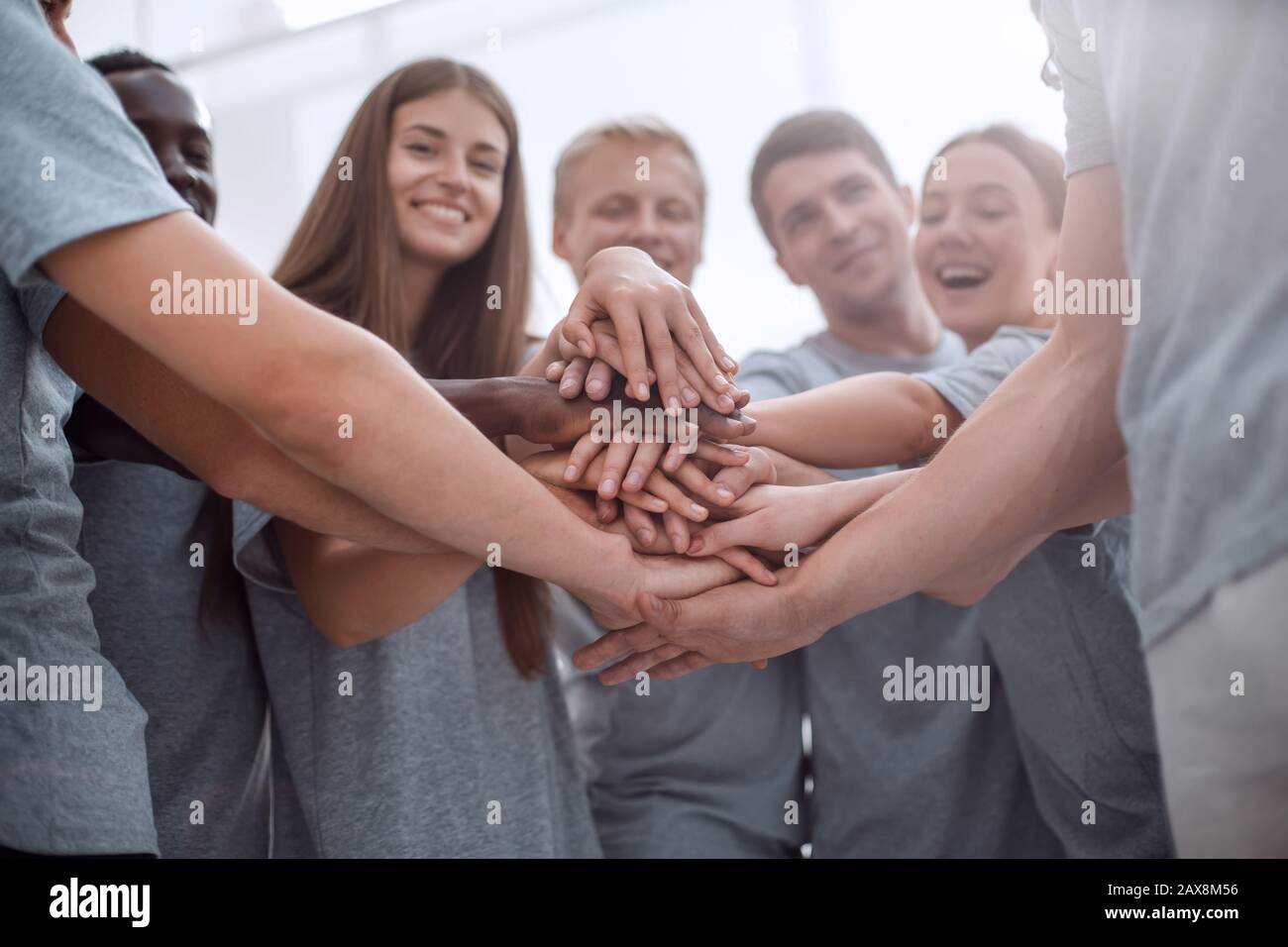 Team mates hands hi-res stock photography and images - Alamy