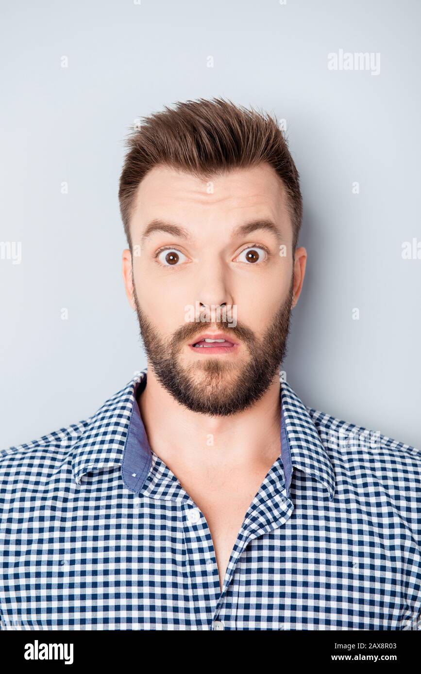 It's unbelievable! Portrait of young handsome shocked man Stock Photo ...