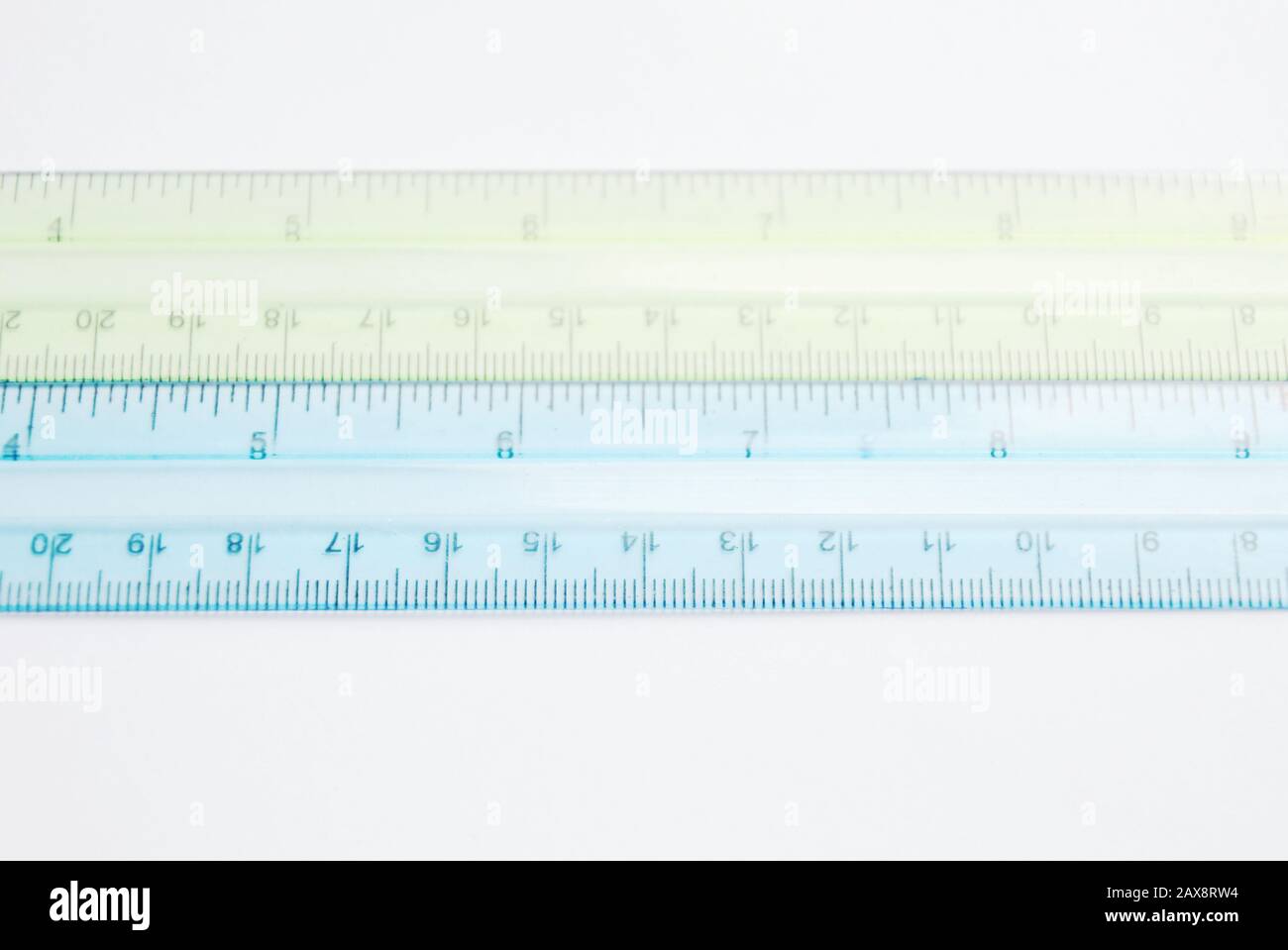 colorful plastic ruler on white background Stock Photo - Alamy