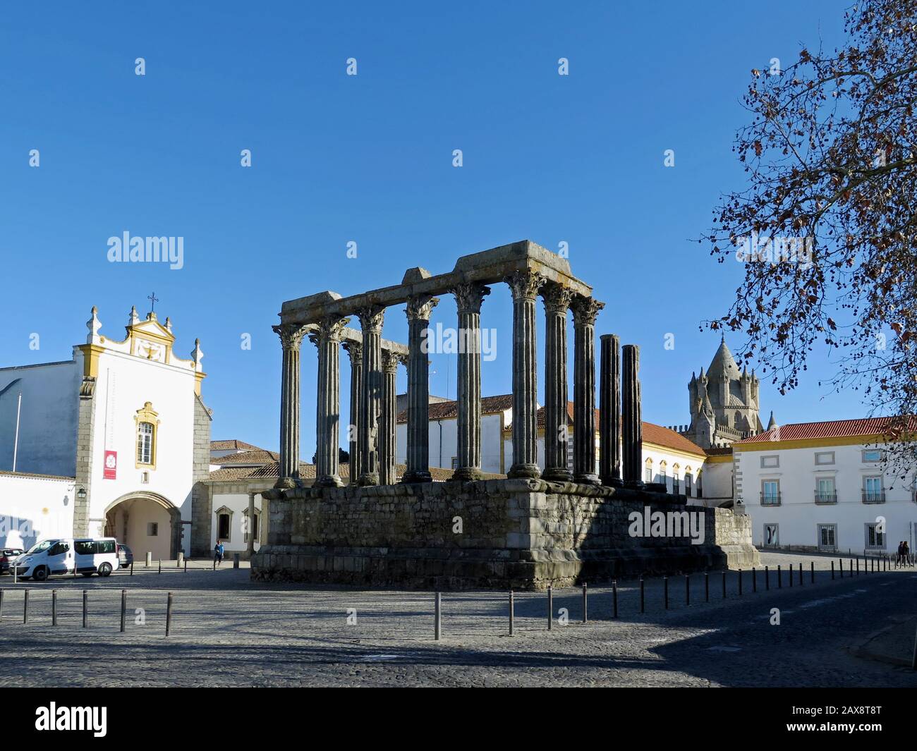 Roman Temple of Évora. In the background the Gothic Cathedral Tower ...