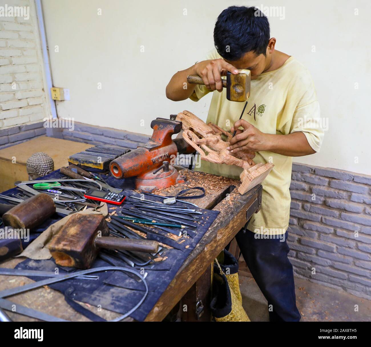 Man using chisel hammer hi-res stock photography and images - Alamy