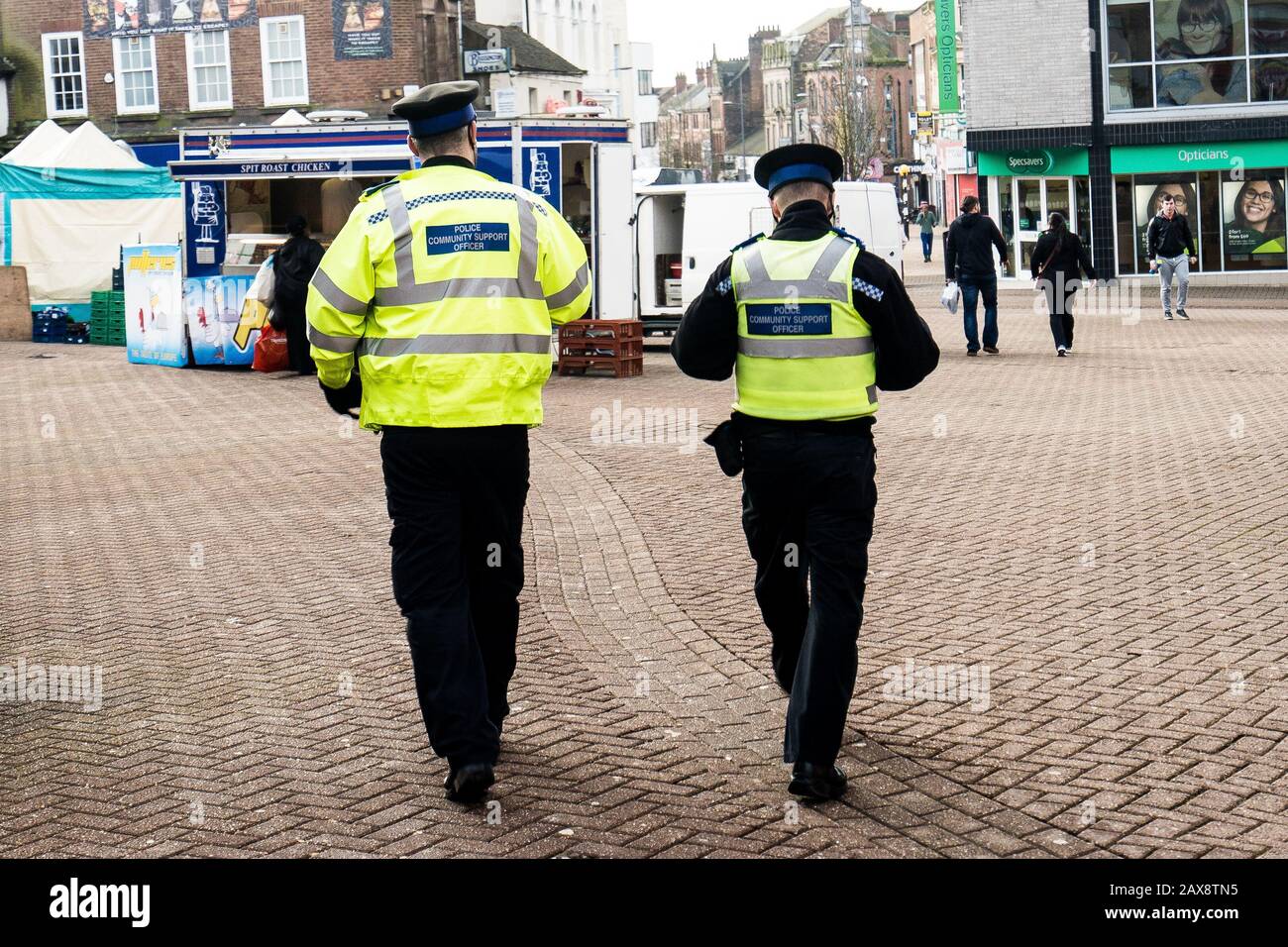 Two Police community support officers walk the streets, city in Hanley ...