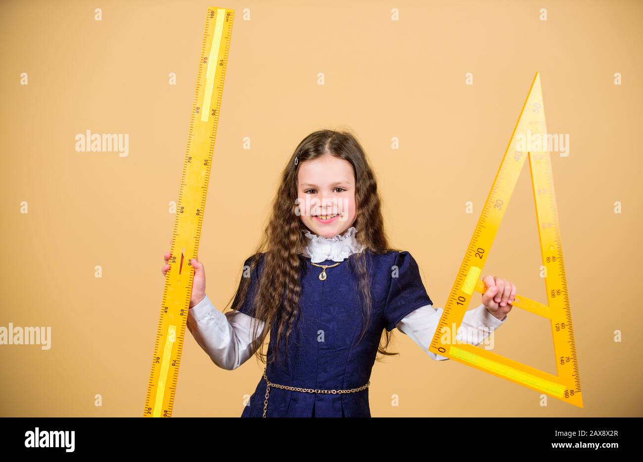 math lesson. Education and knowledge. School student learning geometry ...