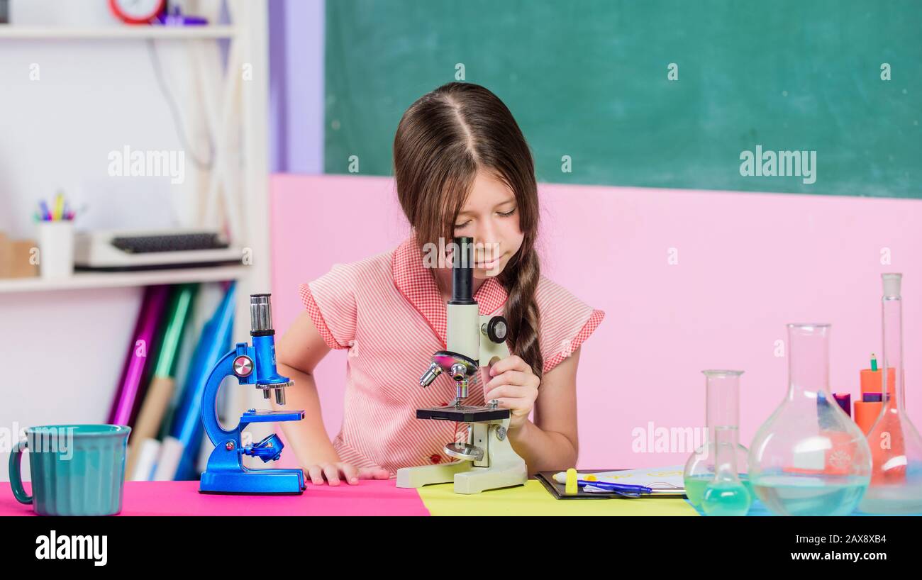 Girl biology class testing tubes. Scientific experiment. Fascinating ...
