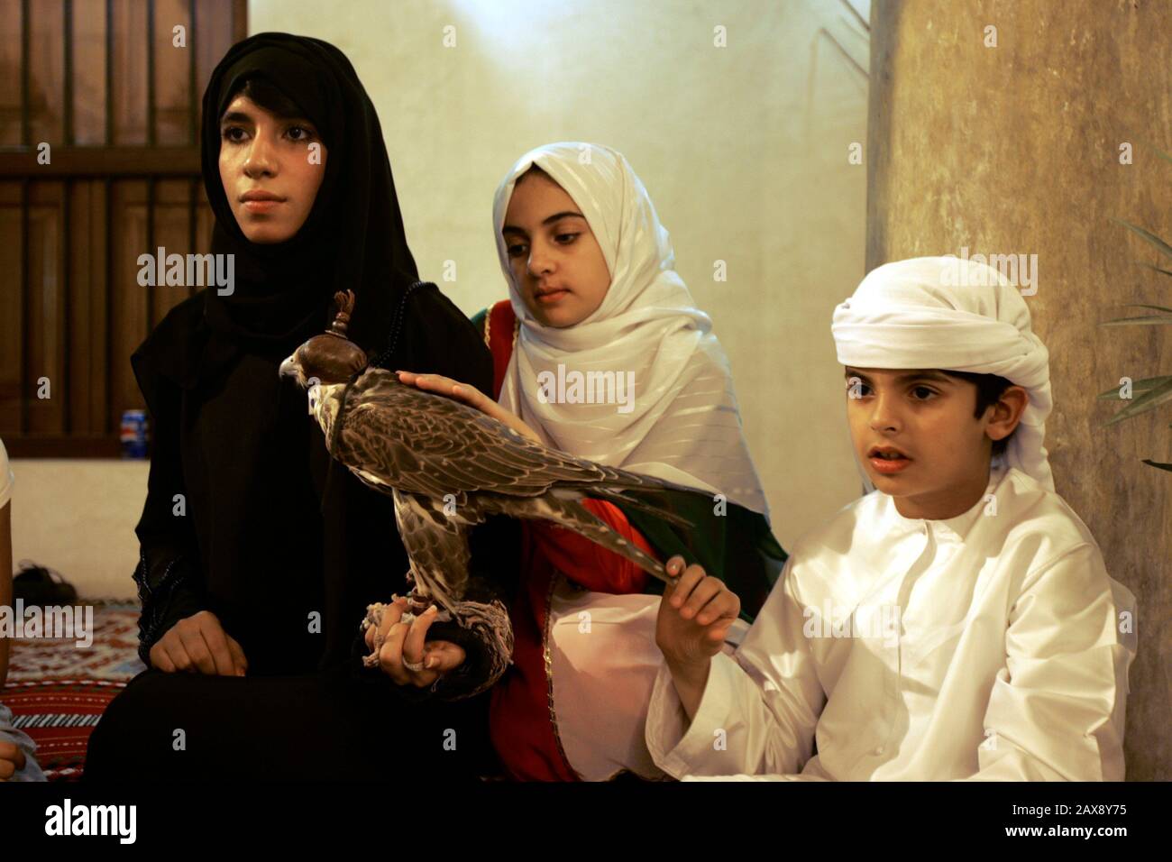 Boy and girl with head scarf hi-res stock photography and images - Alamy