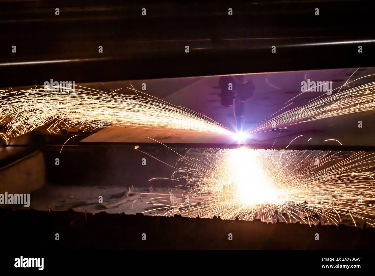 Plasma cutting of metal with a cnc. Plasma cutting machine cutting ...