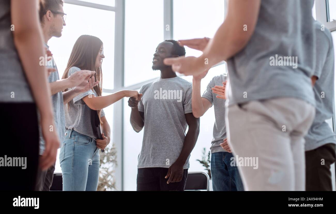 female coach asking questions during business training Stock Photo - Alamy