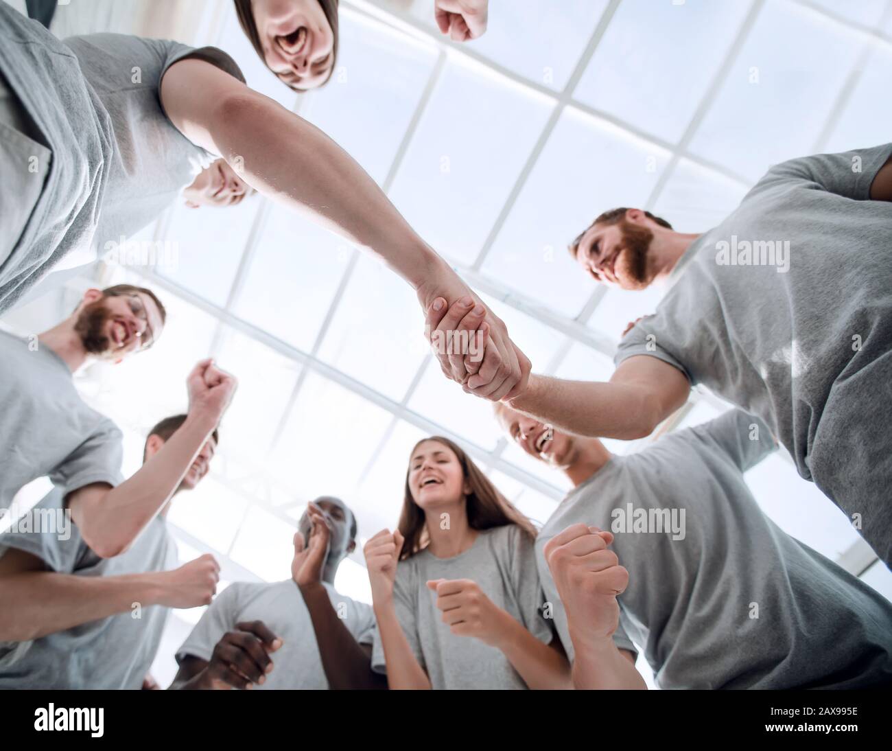 strong handshake of the two leaders in the circle of friends Stock ...