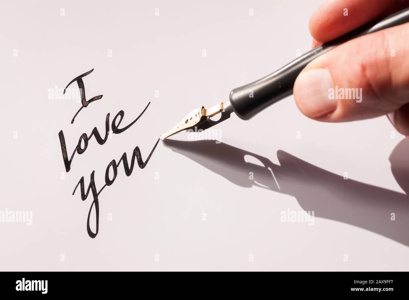 Romantic I Love You message handwritten in black ink with a calligraphy ...