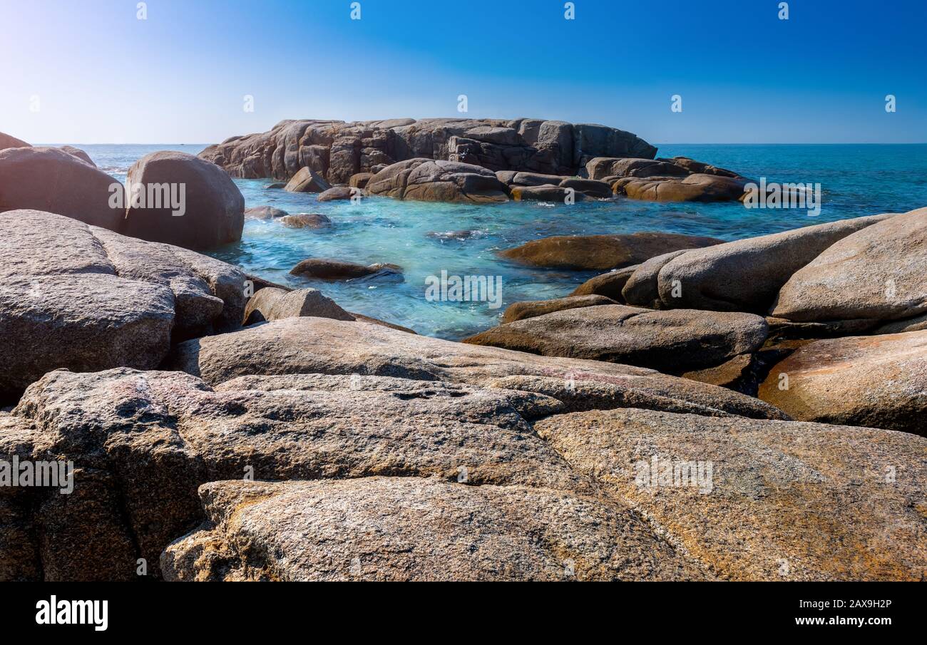 Lanscape view of white stones in blue sea white sand beach with outdoor ...