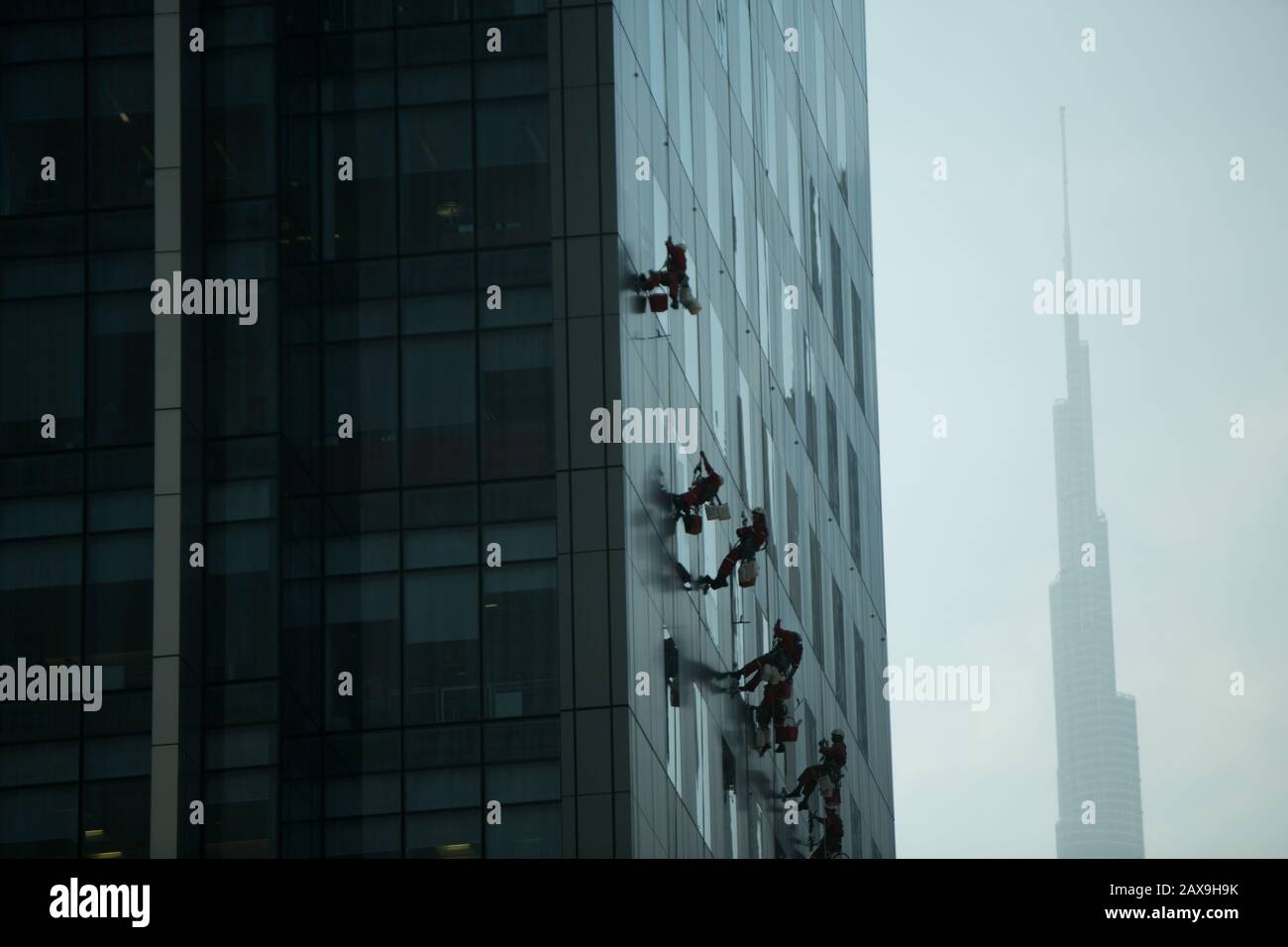 Window Cleaners and Burj Khalifa in background, Dubai, United Arab ...