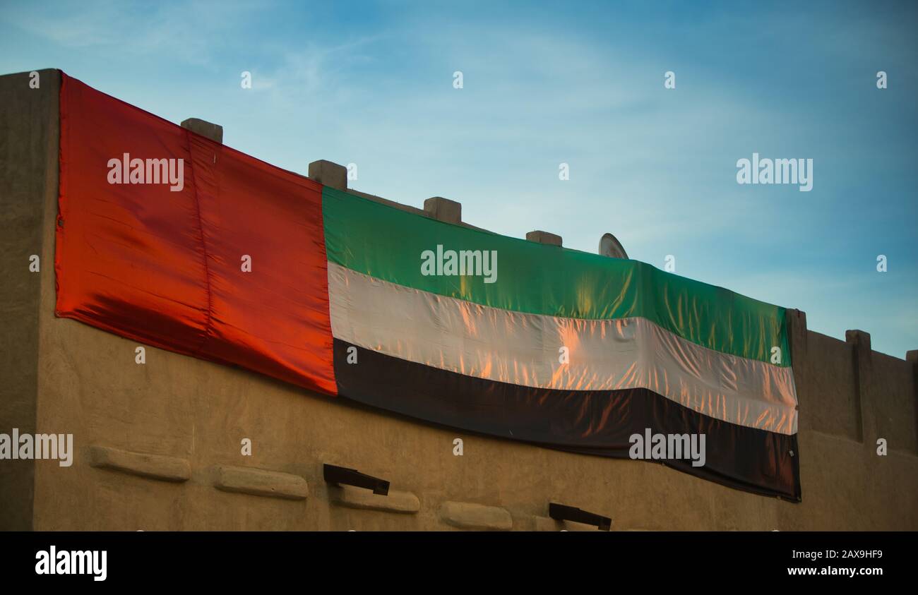 UAE Flag on traditional building, celebrating UAE National Day in Al ...
