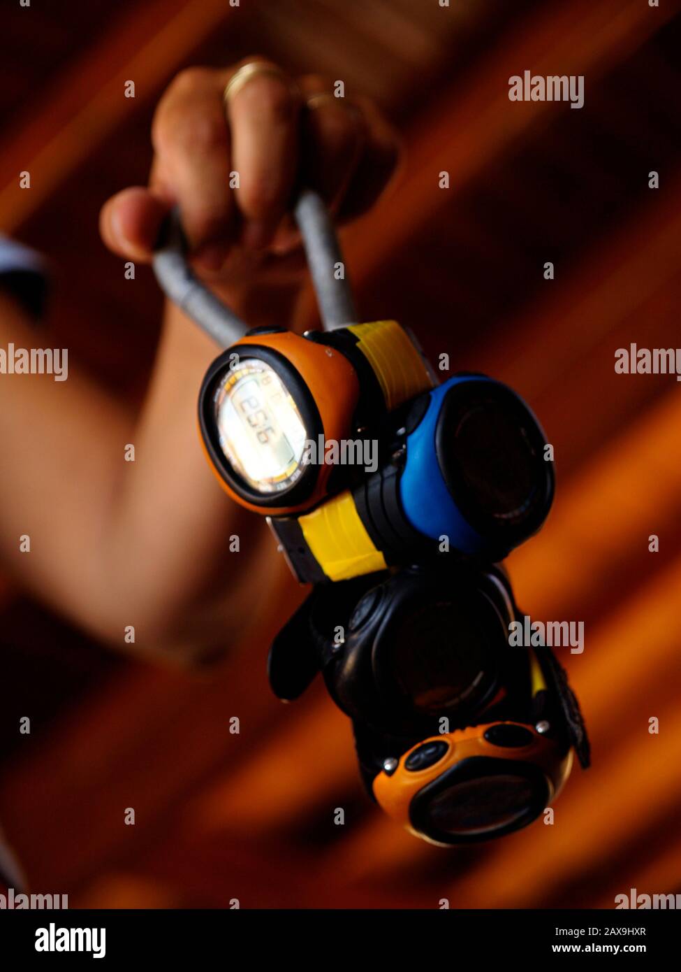 Swedish free diving champion Lotta Ericson holds a bundle of electronic ...