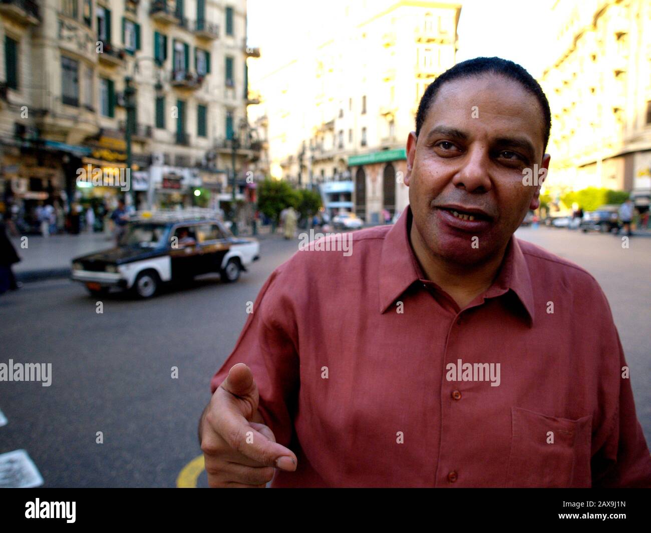 Lauded Egyptian author of the Yacoubian Building, Alaa Al Aswany, walks ...