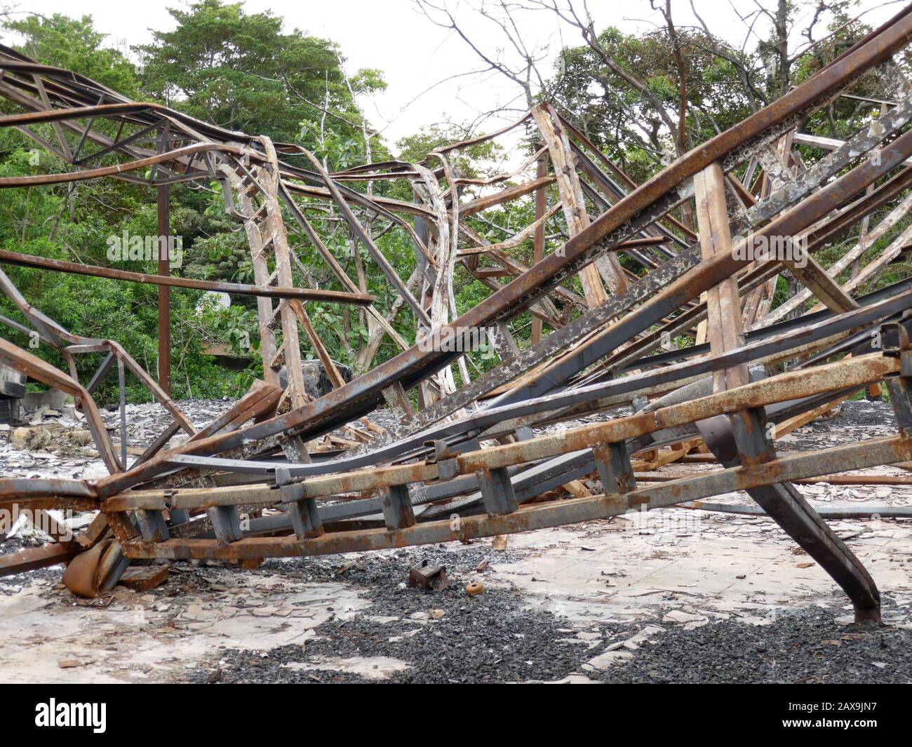 Melted and twisted metal house structure after large fire Stock Photo ...