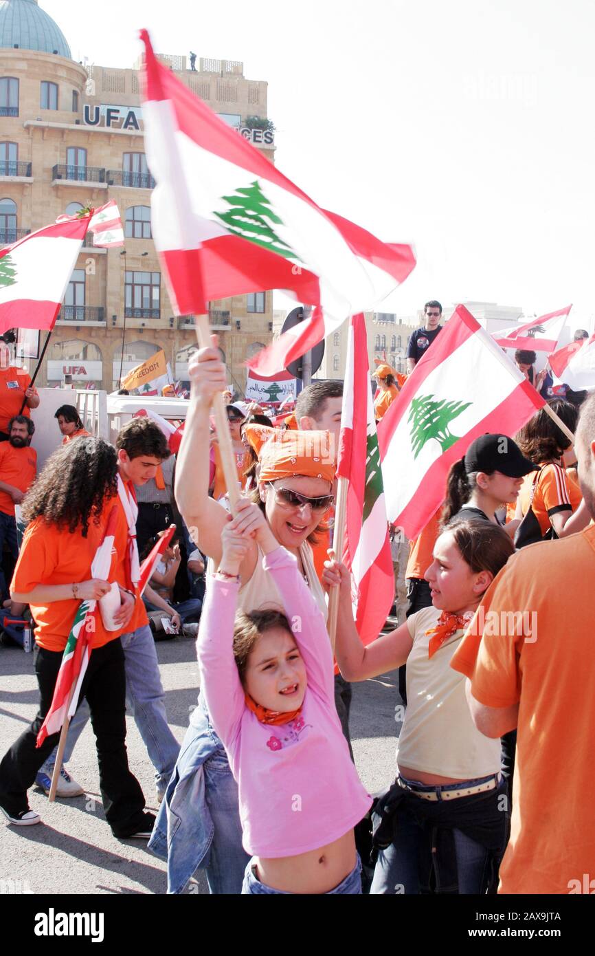 Happy group of people waving flags hi-res stock photography and images ...