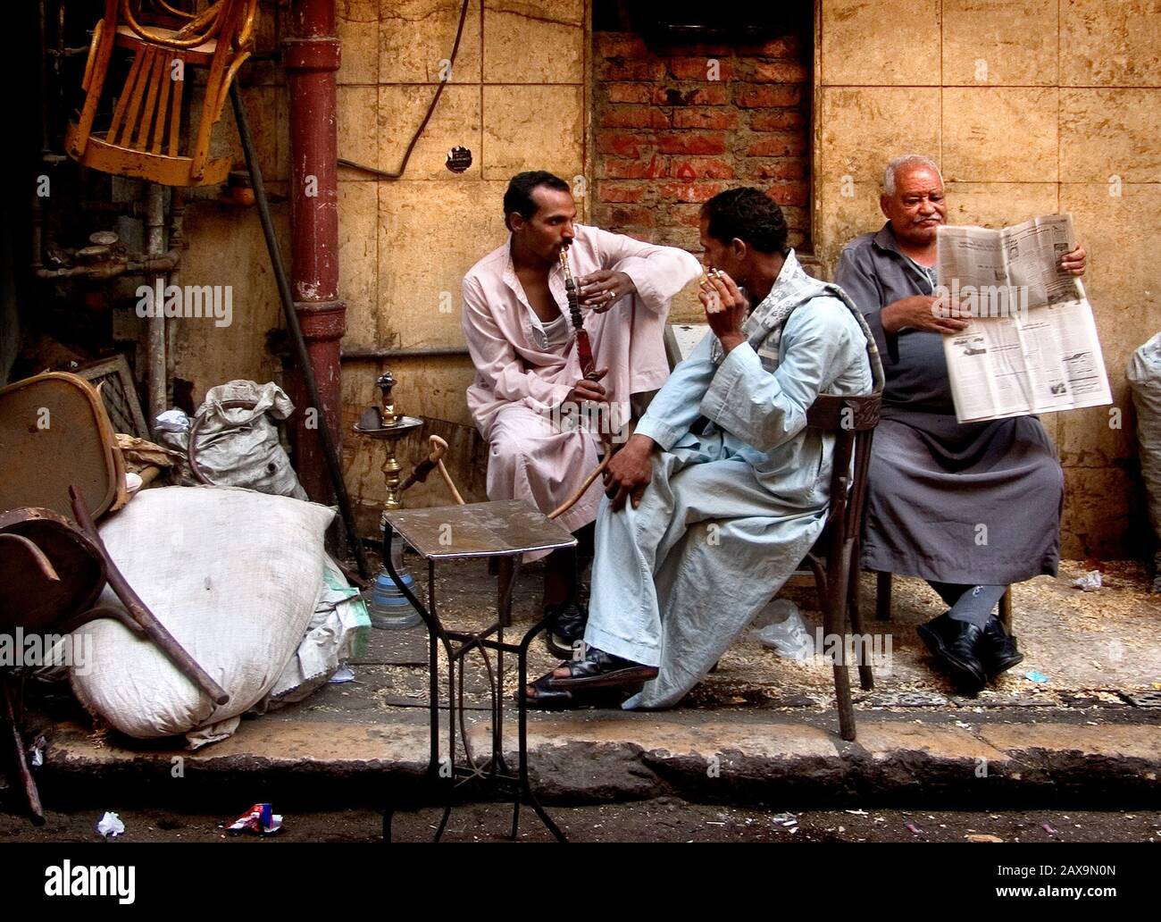Three men taking time out, downtown Cairo, Egypt Stock Photo - Alamy