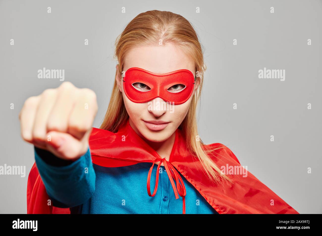 Young blond woman dressed as superhero at carnival Stock Photo - Alamy Young blond woman dressed as superhero at carnival Stock Photo - Alamy