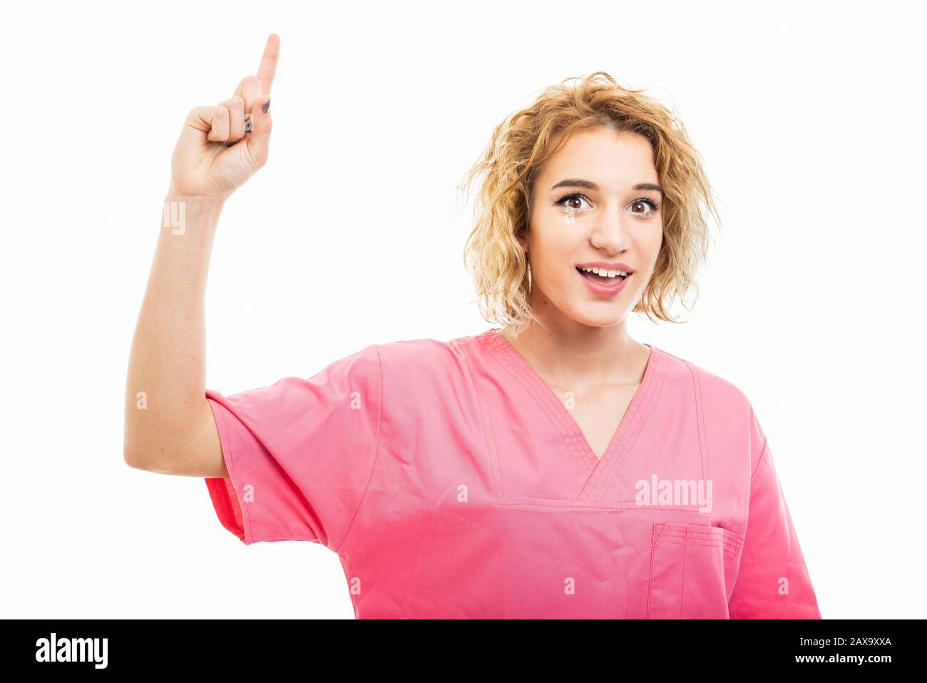 Portrait Of Nurse Wearing Pink Scrub Making Idea Gesture Isolated On