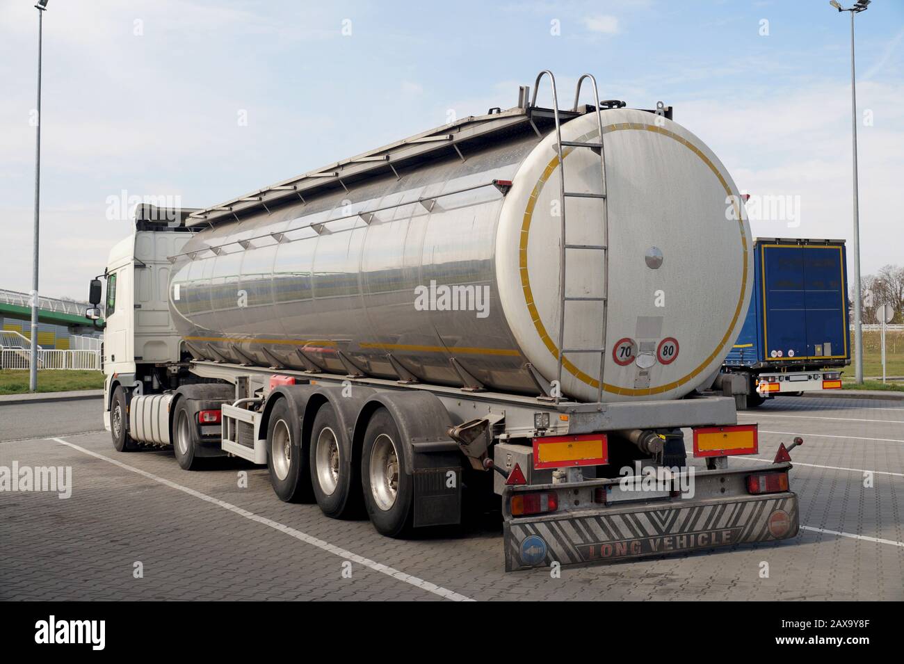 Long vehicle.. A truck with a tanker designed to transport food ...