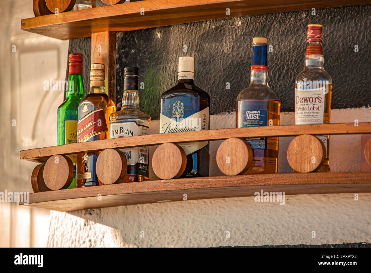 Bottles of alcohol on the bar shelf 3 Stock Photo - Alamy