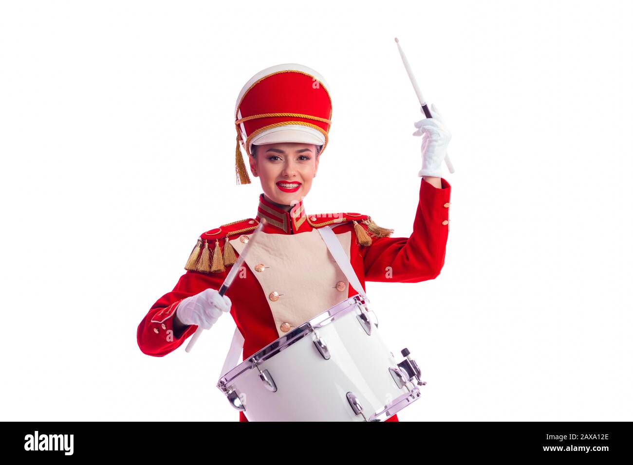 Drummer in a red uniform drums on a drum, show program and celebration ...
