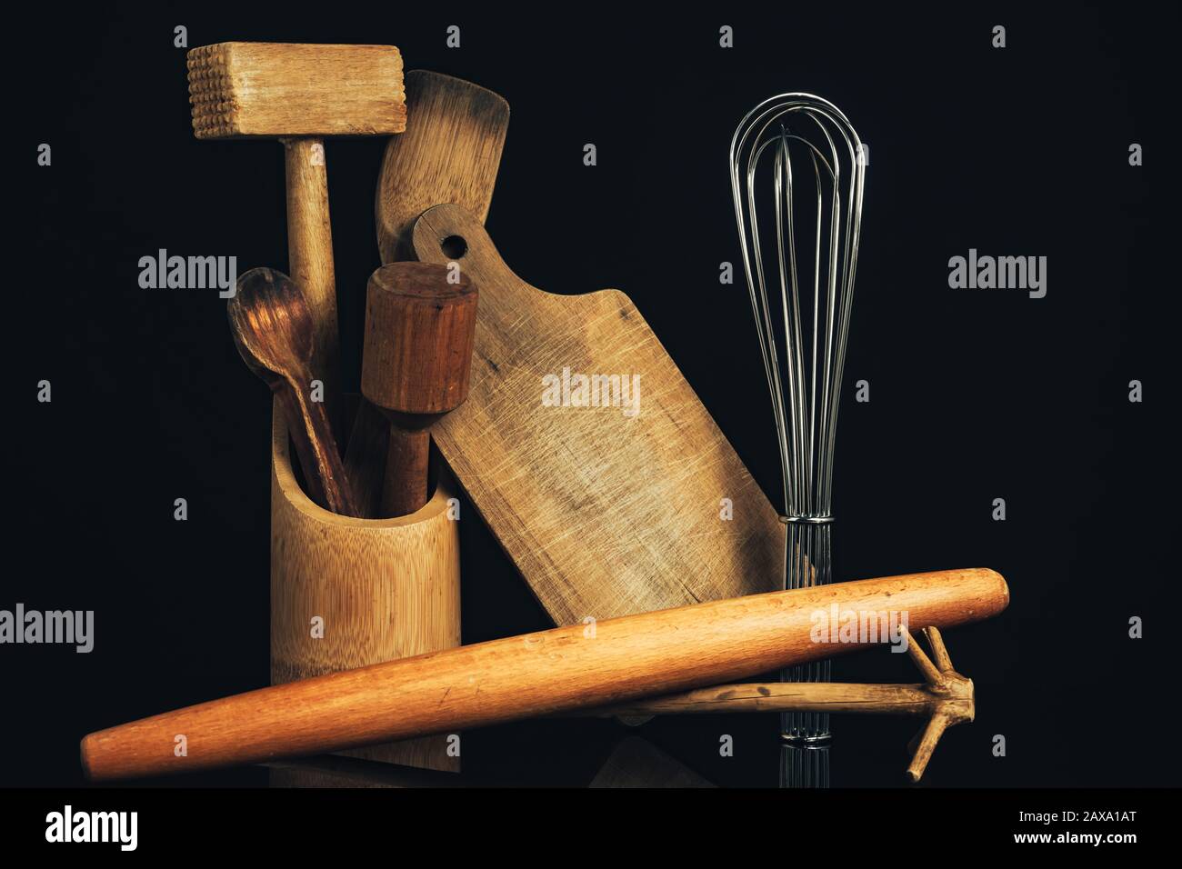 Beautiful vintage kitchen utensils on a oak glass table and black ...