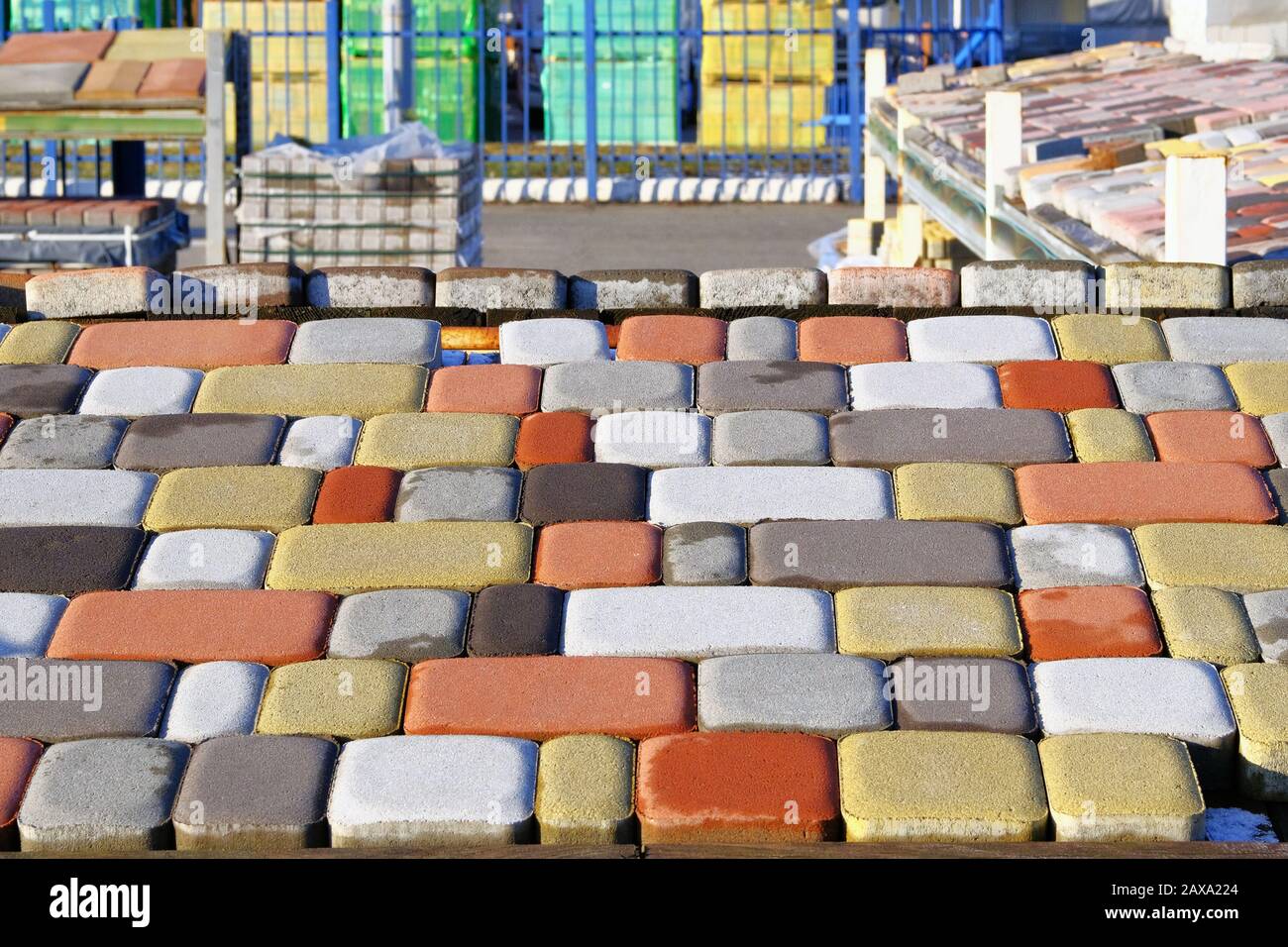 Bricks and tiles of pavement at construction site. Warehouse paving ...