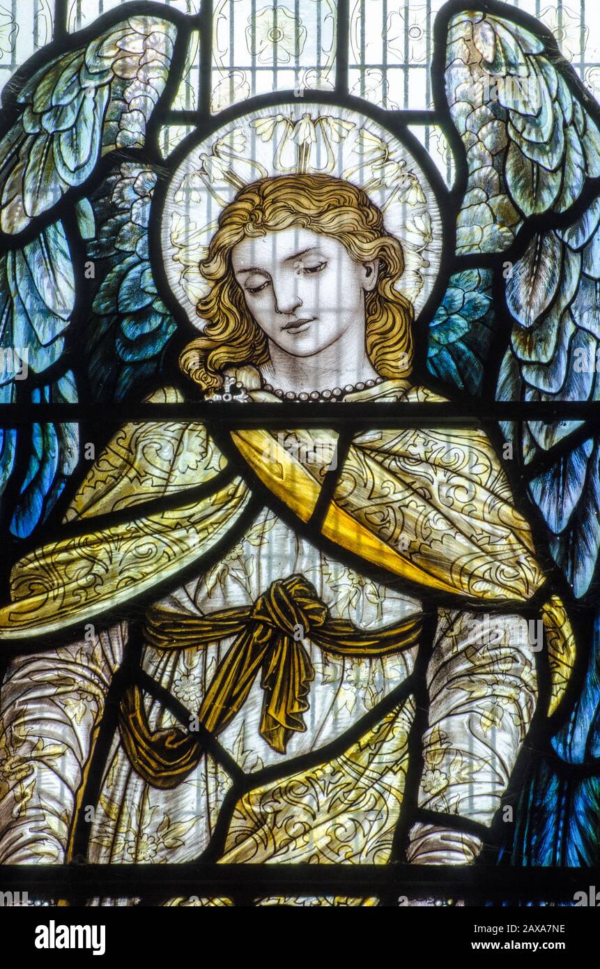 Historic Victorian stained glass window showing an angel with blue ...