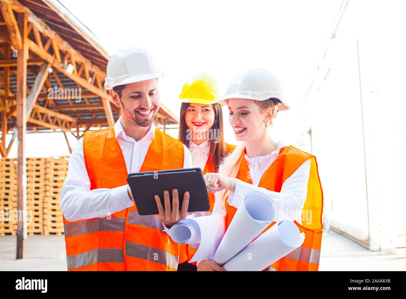 Love triangle in workplace among young engineers Stock Photo - Alamy