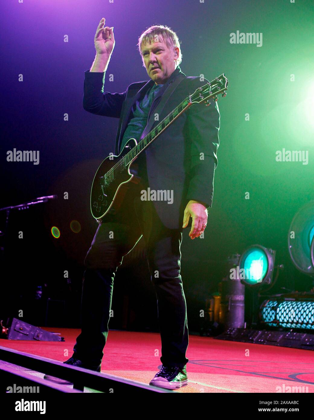 Rush's Alex Lifeson performs with Neil Peart and Geddy Lee at the BB&T ...