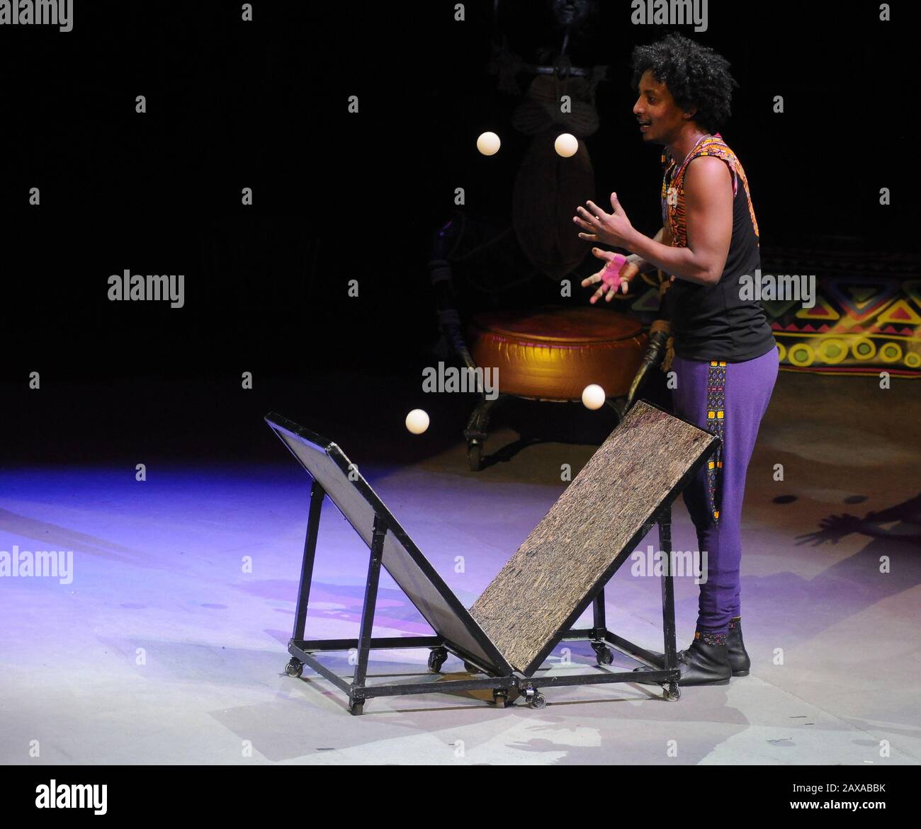 An artist performs during the grand opening of the new circus show ...