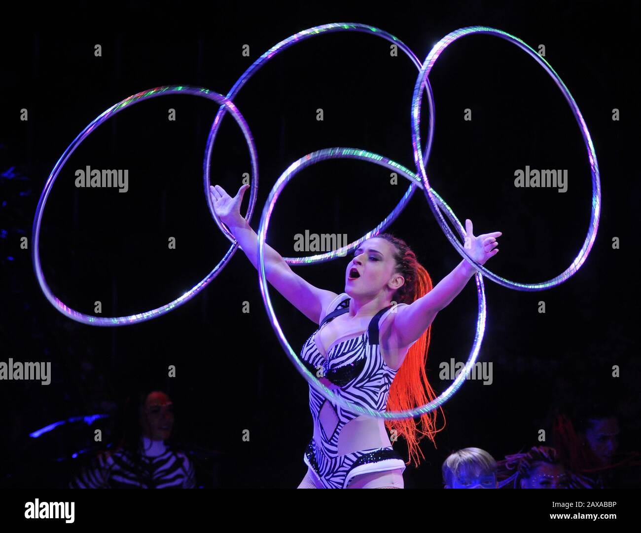 An artist performs during the grand opening of the new circus show ...