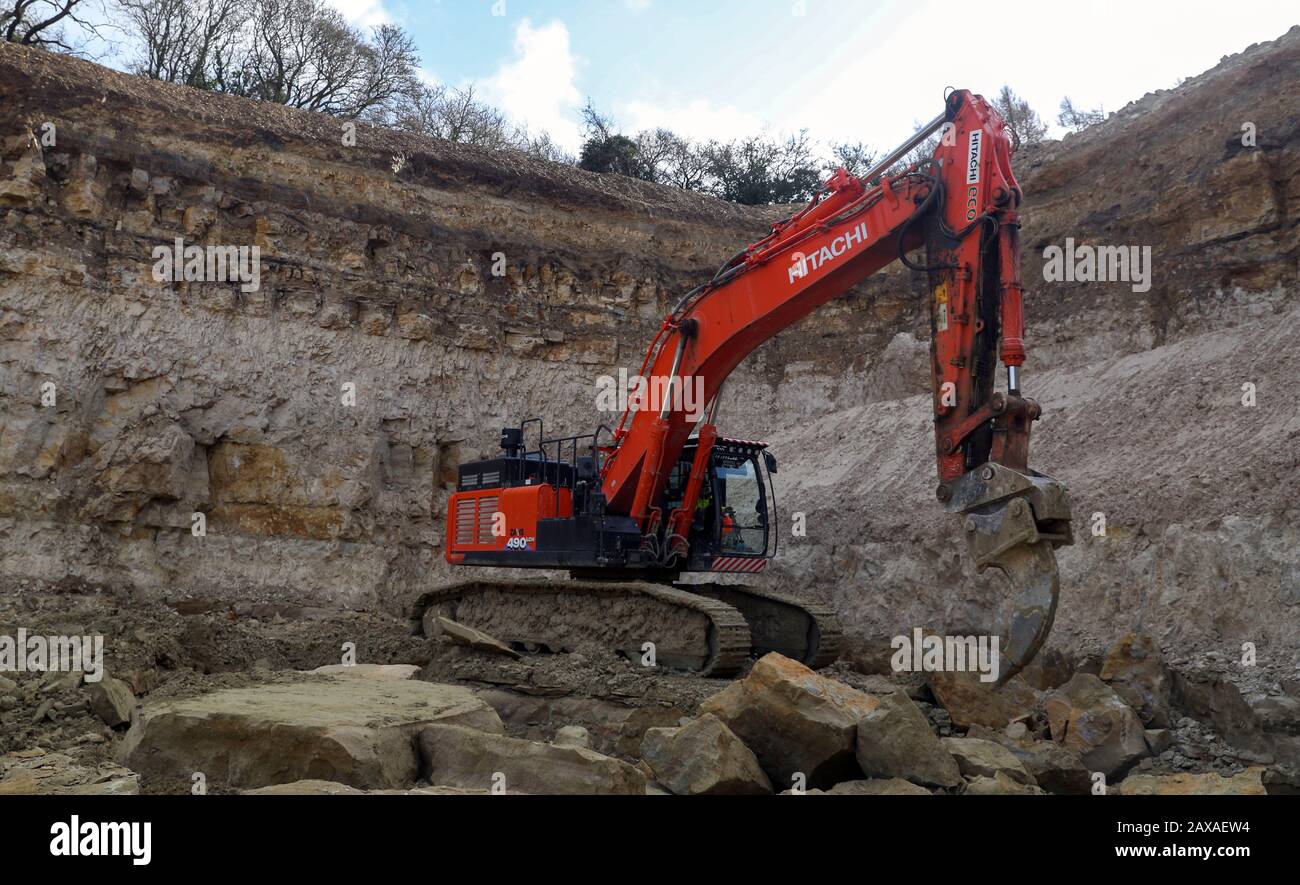 A excavator working at Chicksgrove Quarry in Tisbury, Wiltshire. PA ...