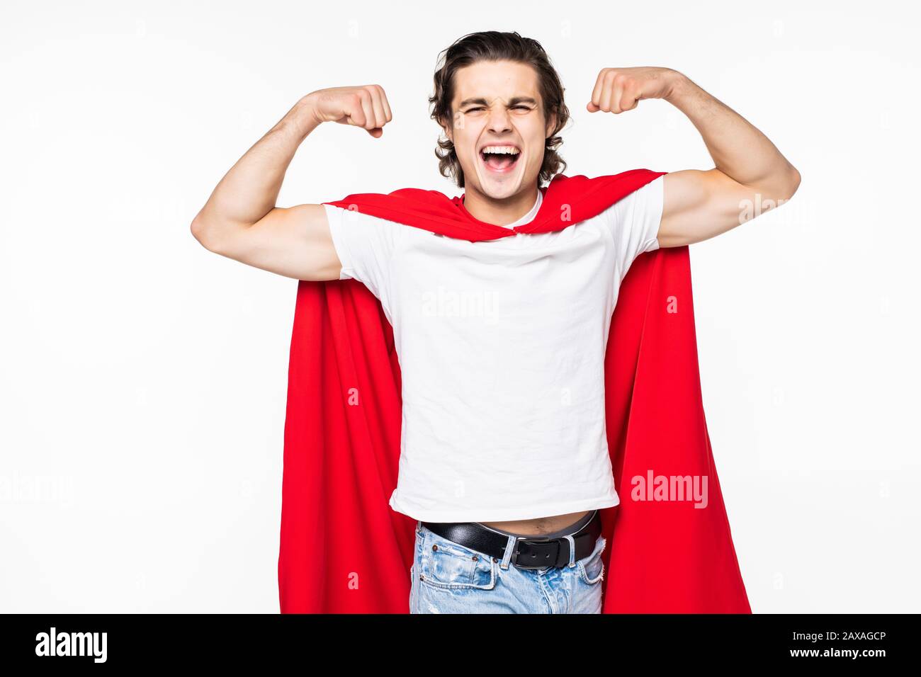Portrait of man wearing bright super look outfit mantle isolated over ...