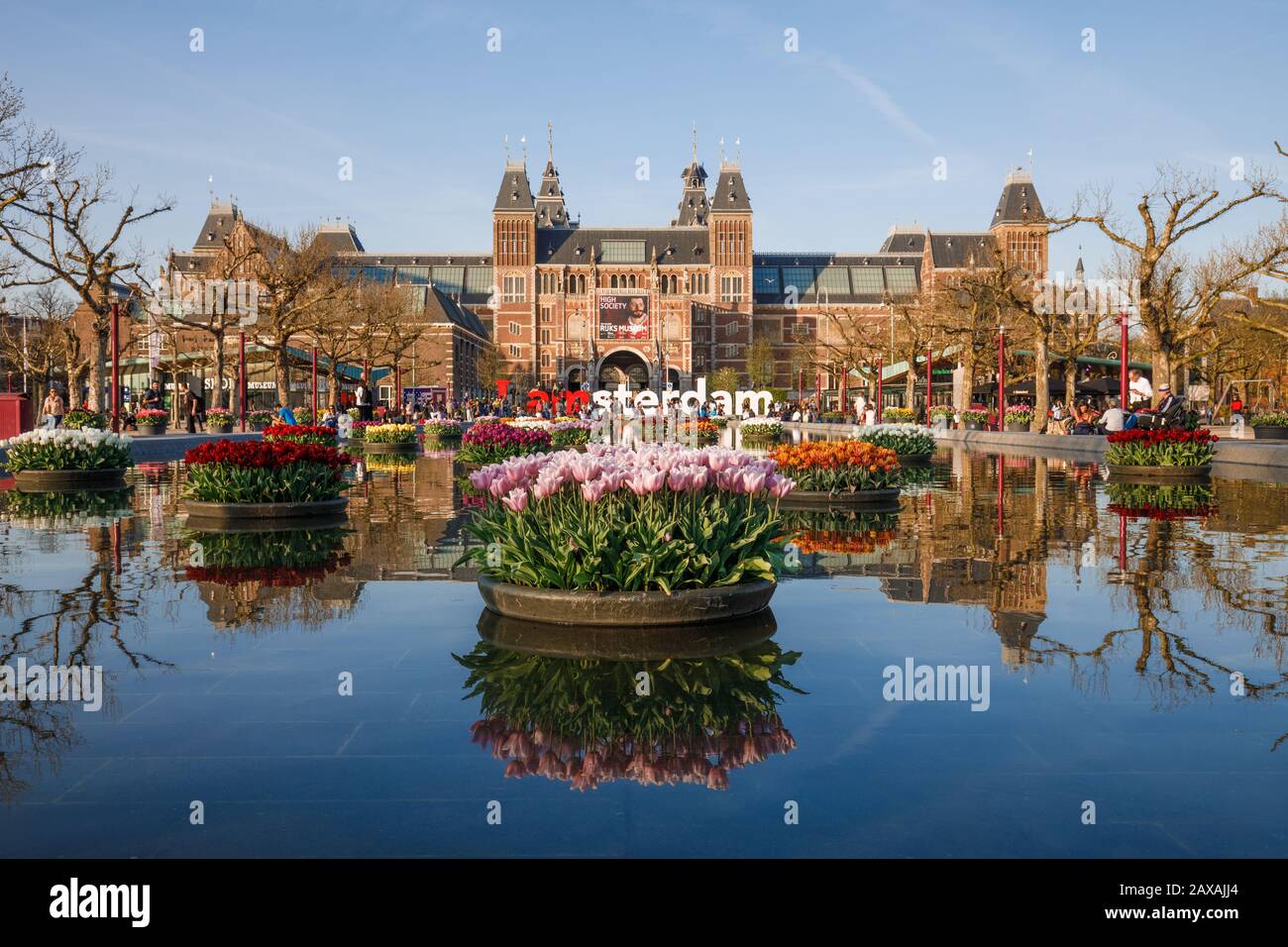 Museumplein scenery with blooming tulips in front of the Rijksmuseum ...