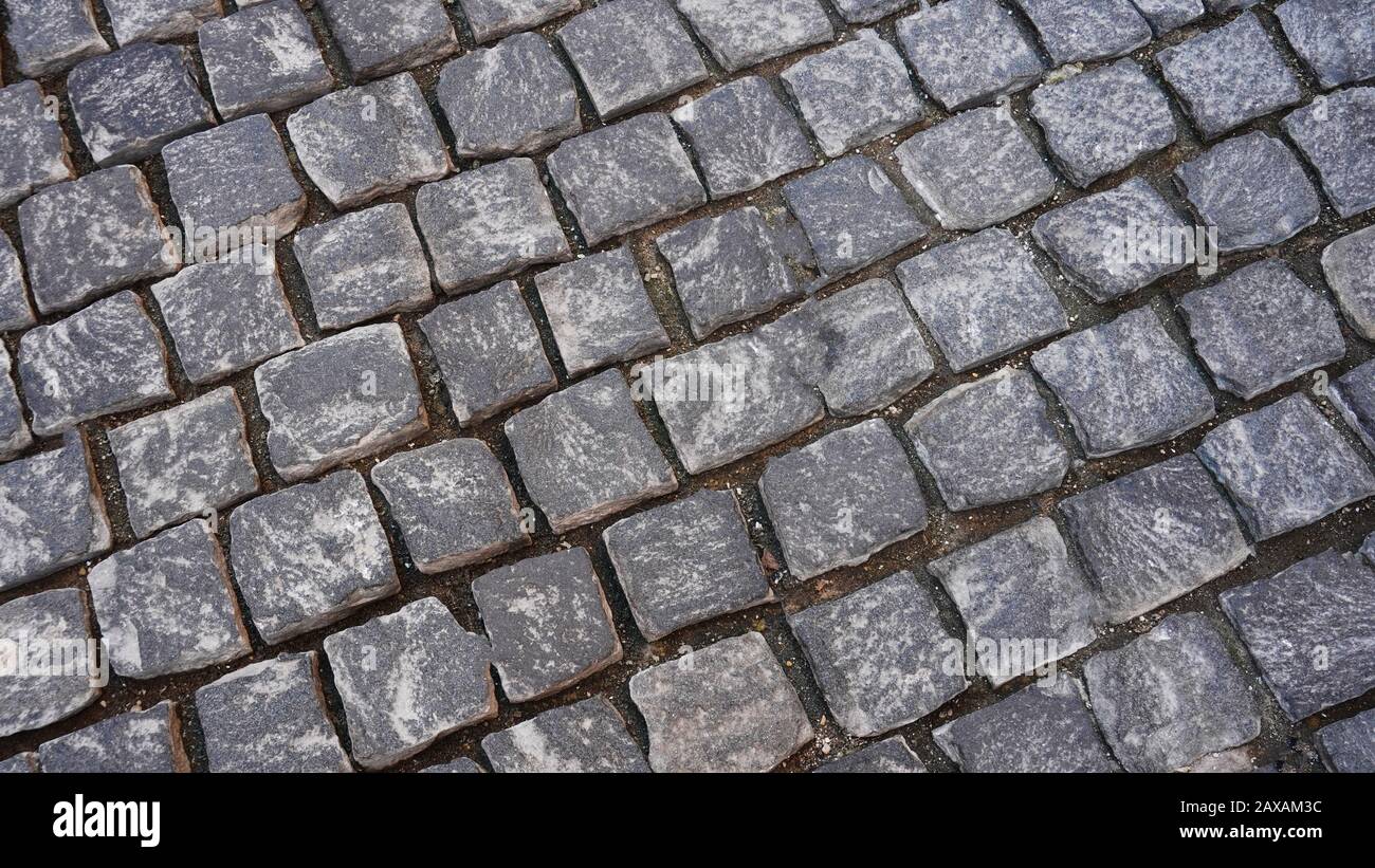 Granite cobblestone sidewalk cubic stone close up background texture ...