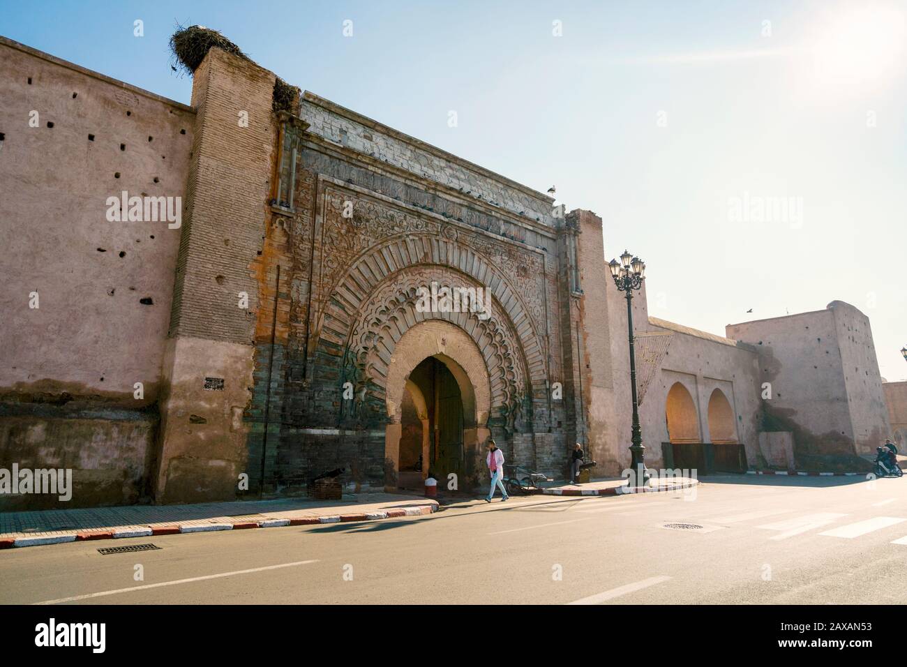 Massive gate in medieval city walls of Marrakech, Morocco Stock Photo ...
