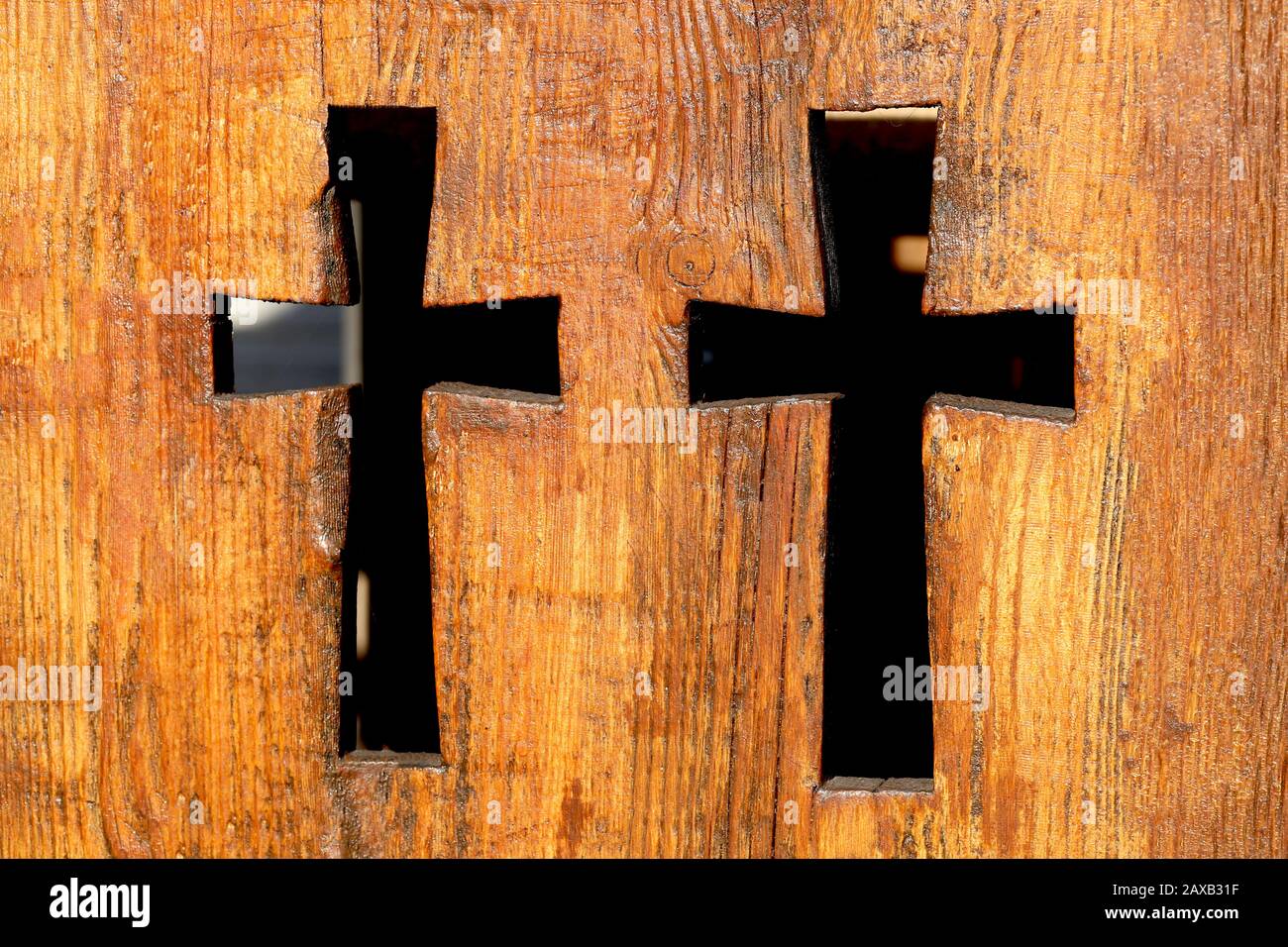 Two christian orthodox crosses carved in wood. Religious symbol ...