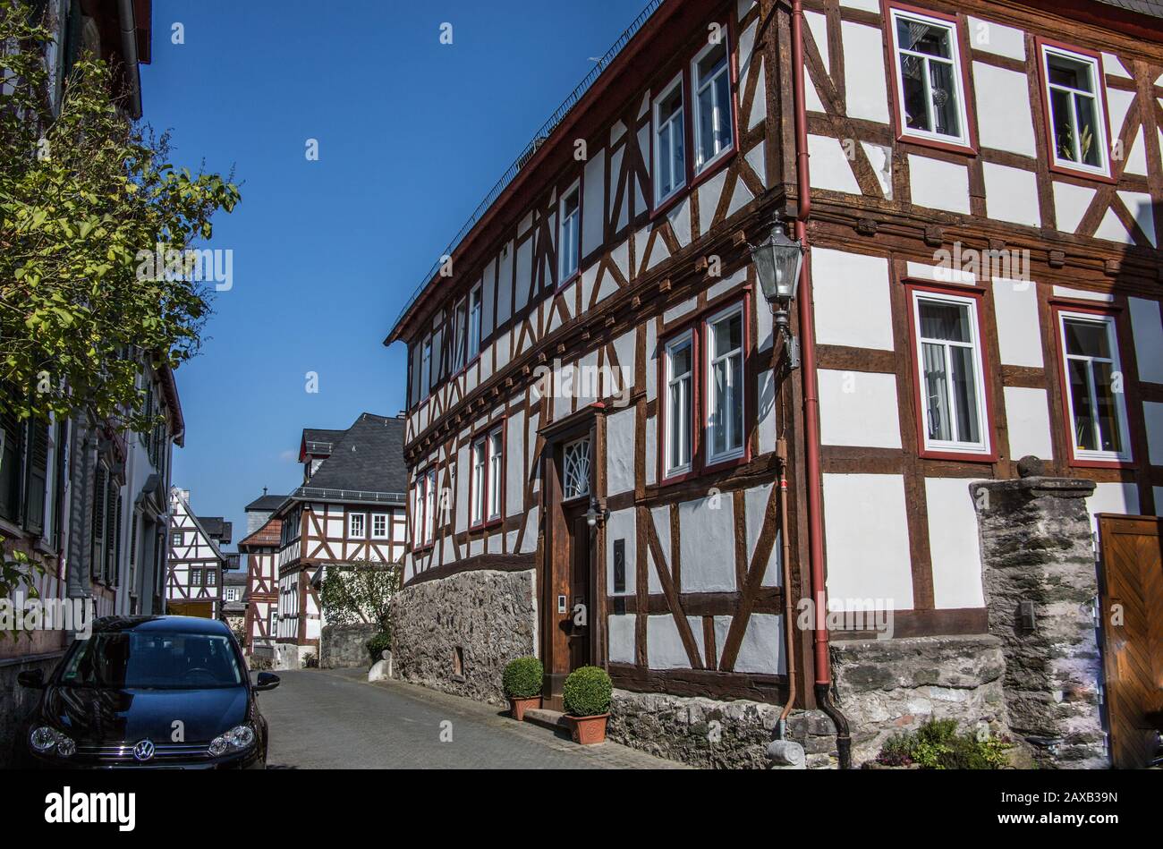 Half-timbered houses under the castle Stock Photo - Alamy