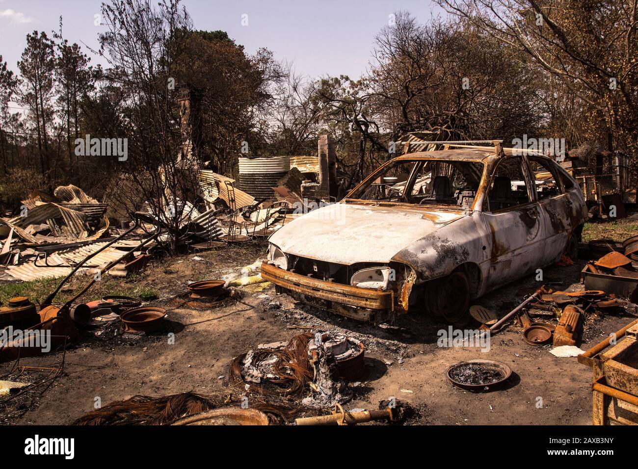 Building and car destroyed by fire. Bushfire aftermath, Australia Stock ...