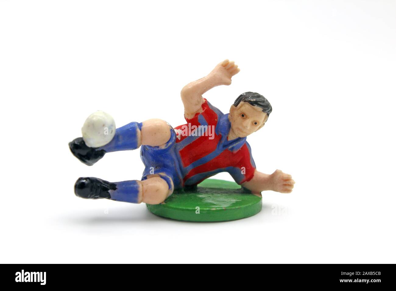 Miniature football player, isolated on a white background Stock Photo ...