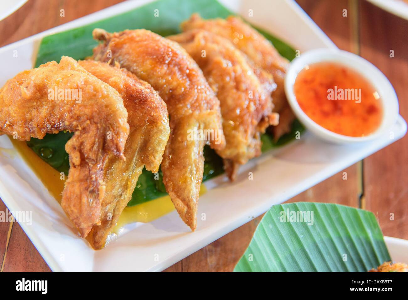 Chicken wing fried with sauce Stock Photo - Alamy