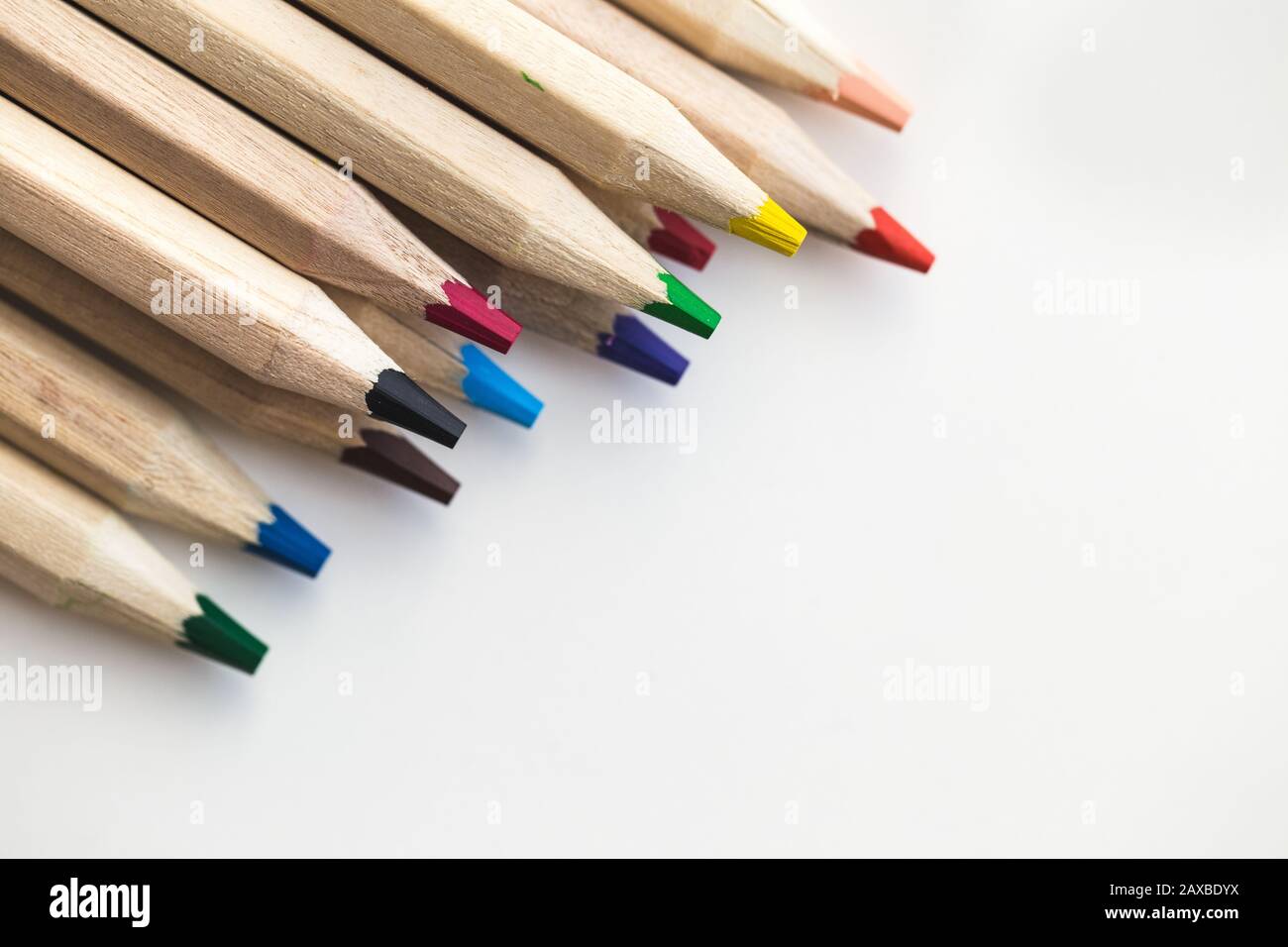 Wooden colorful ordinary pencils on a white background Stock Photo - Alamy