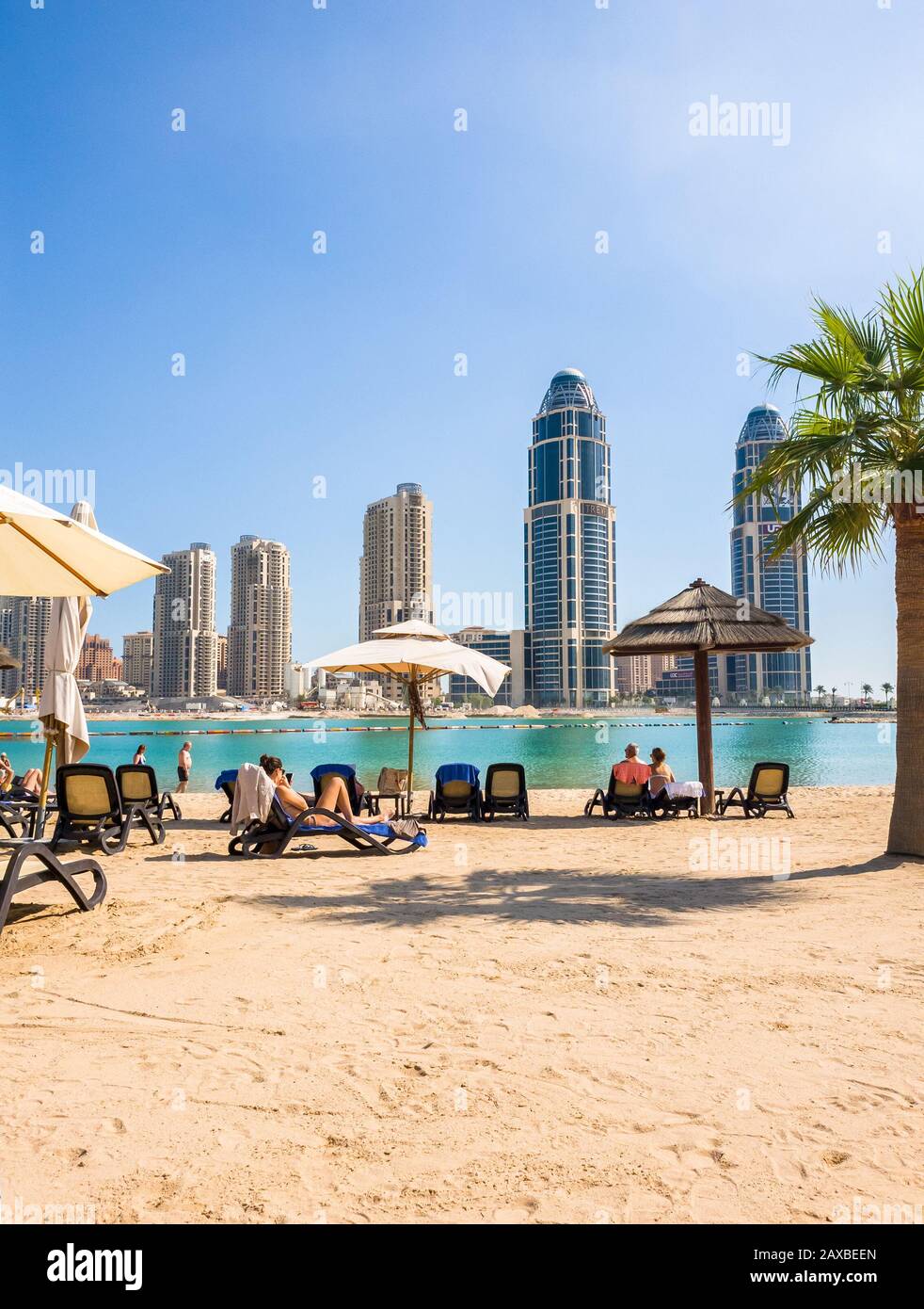 Doha, Qatar - Nov 11. 2019. Beach on background of skyscrapers on the ...