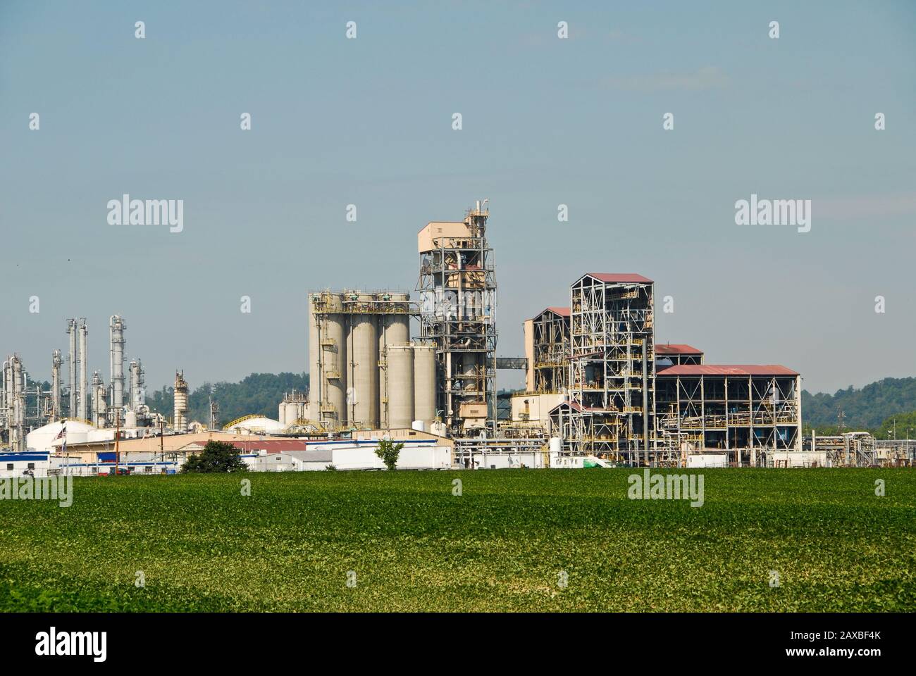 Oil Refinery Plant surrounded by Farmland Stock Photo - Alamy